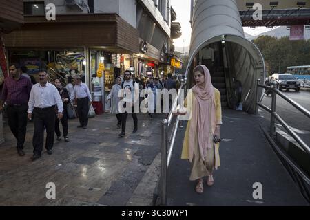 People walk at Tajrish square in northern Tehran, Monday, June 15, 2026 ...