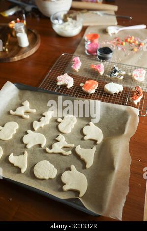 Fresh homemade decorated halloween cookies and sweets on dark ...