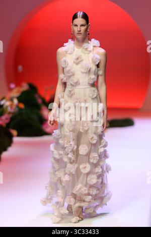 A model walks the runway during the Ginger & Smart show during the ...