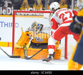 Detroit Red Wings center Michael Rasmussen, left, collides with Tampa ...