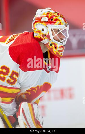 Calgary Flames goaltender Jacob Markstrom (25) makes a save during an ...