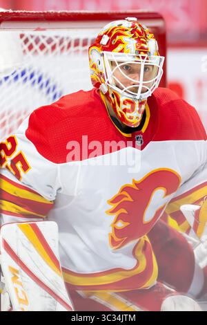 Calgary Flames goaltender Jacob Markstrom (25) makes a save during an ...