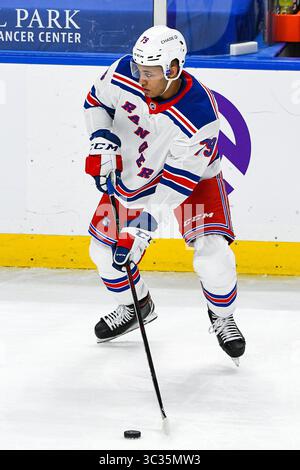 New York Rangers defenseman K'Andre Miller (79) and Minnesota Wild left ...