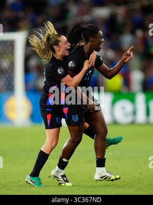 England's Michelle Agyemang (right) celebrates scoring their side's ...