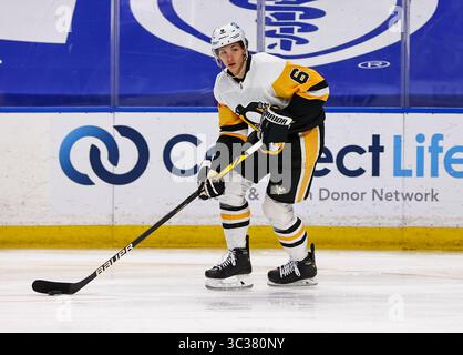 Pittsburgh Penguins' John Marino skates during the third period of an ...