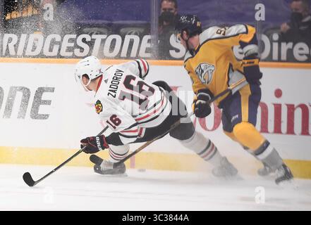 Chicago Blackhawks defenseman Nikita Zadorov (16) handles the puck ...