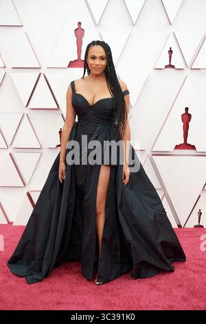 Nicolette Robinson arrives at the Oscars on Sunday, April 25, 2021, at ...