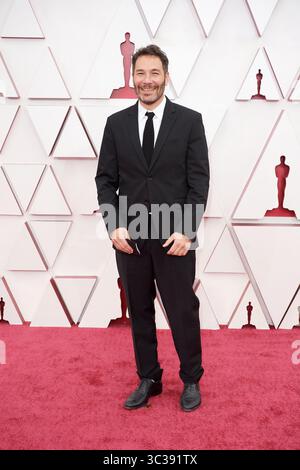 Dan Swimer arrives at the Oscars on Sunday, April 25, 2021, at Union ...