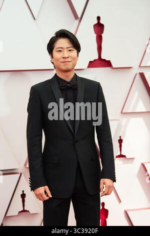 Erick Oh arrives at the Oscars on Sunday, April 25, 2021, at Union ...