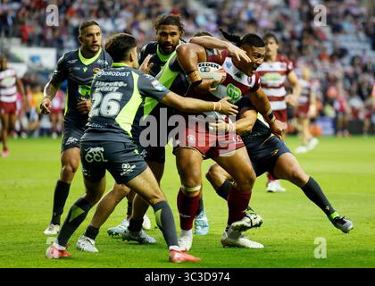 Wigan Warriors' Patrick Mago is tackled during the Betfred Super League ...