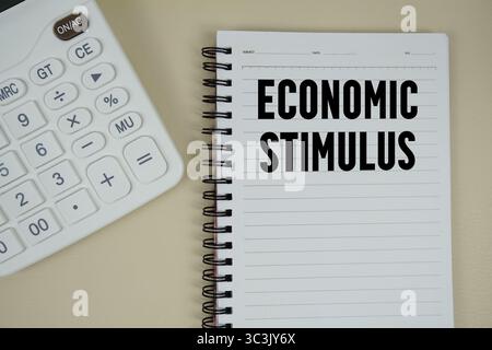 CORONAVIRUS STIMULUS PACKAGE text with currency banknotes, world globe ...