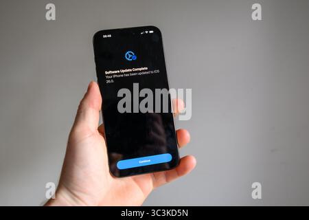 This image shows an iPhone that has just completed the iOS 26 update ...