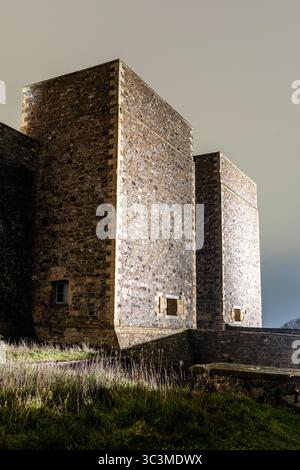 Lit up by spotlights the two strong defending towers guarding the King ...
