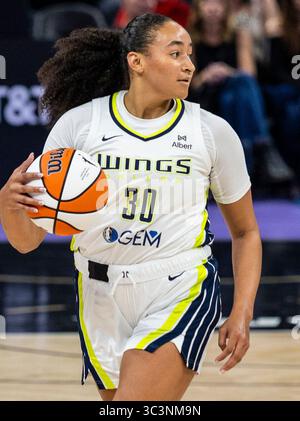 Dallas Wings guard Haley Jones (30) shoots over Indiana Fever guard ...