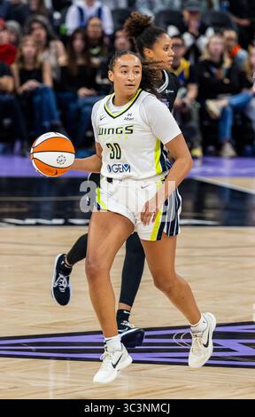 Dallas Wings guard Haley Jones (30) shoots over Indiana Fever guard ...
