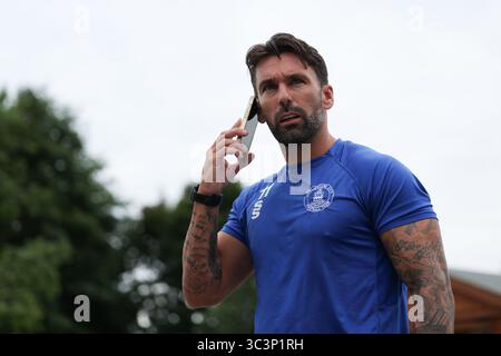 Ricky Holmes, of Chelmsford City, walking into the pitch for the match ...