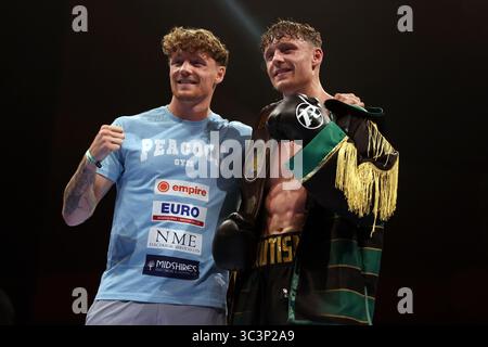 Carl Fail (right) celebrates beating Amir Abubaker after their super ...
