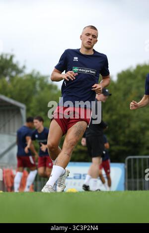 Archie Tamplin, of Chelmsford City, warming up during the match between ...
