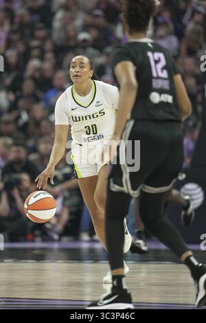 Dallas Wings guard Haley Jones prepares to shoot a basket against the ...