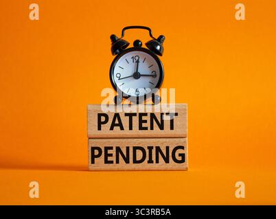 Wooden blocks with symbol of patent concept Stock Photo - Alamy