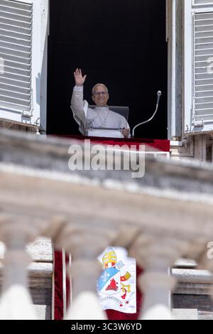 Pope Leo XIV waves to the faithful at the end of the Easter Sunday Mass ...