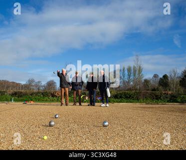 Group of men playing boules in Calvi, Corsica, France Stock Photo - Alamy