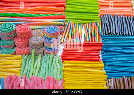 Multi-colored long jelly candies in the store Stock Photo - Alamy