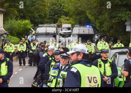 Protesters marching near the Bell Hotel in Epping, Essex after a ...