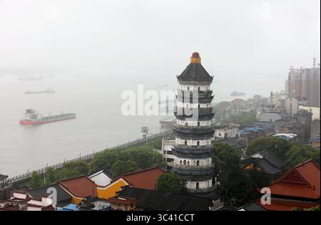 Anqing, China. 11th May, 2021. The tower spire of Zhenfeng Tower was ...
