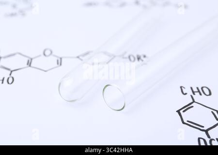 Chemical tubes with reaction formulas Stock Photo - Alamy