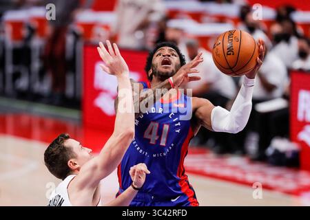 Detroit Pistons forward Duncan Robinson walks on the court before an ...