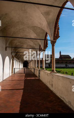 Italy: the cloisters with the monks cells in the Certosa di Pavia ...