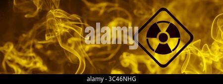 Radioactive sign and yellow toxic smoke against black background ...