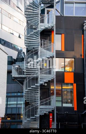 High-Rise Building with Spiral Staircase and Utility Infrastructure at ...