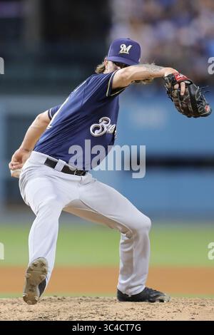 Milwaukee Brewers' Josh Hader pitches during the ninth inning of a ...