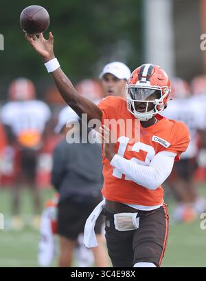 Cleveland Browns quarterback Shedeur Sanders smiles after throwing a ...