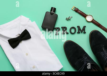 Word PROM with male shirt, perfume bottle and rose on white grunge ...