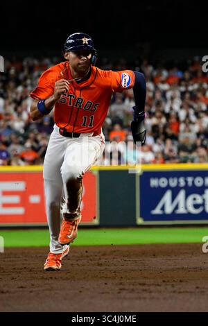 Houston Astros' Christian Walker runs to first base during a baseball ...