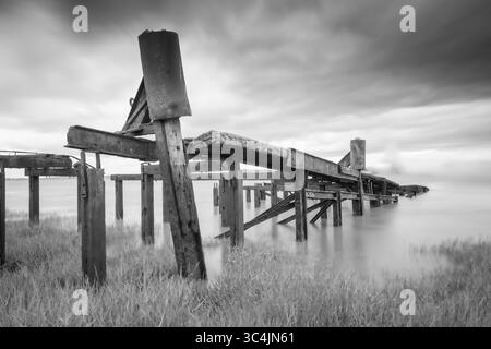 the derelict remains of the Aust car ferry terminal in the Severn ...