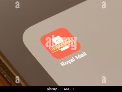 Royal Mail app on smartphone screen with a VISA card to make payment ...