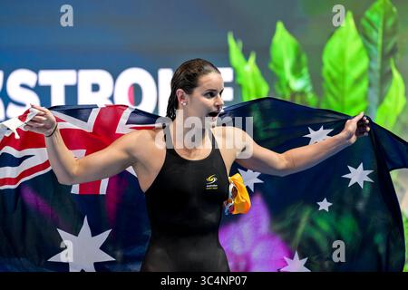 Kaylee McKeown of Australia celebrates after winning the gold medal in ...