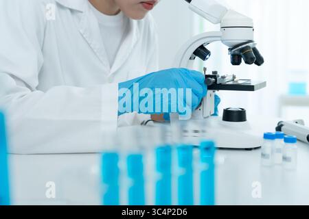 Scientist analyze biochemical samples in advanced scientific laboratory ...