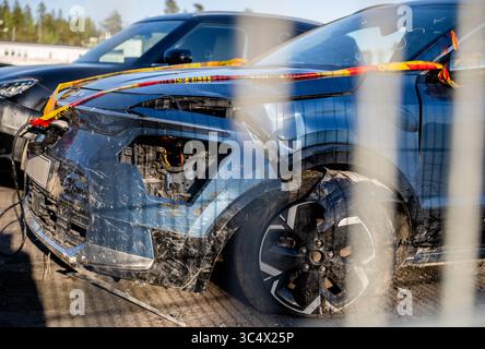 Wrecked and burned cars in scrapyard after crashes, showing severe ...