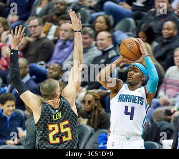 Charlotte Hornets guard Devonte' Graham (4) brings the ball up court ...