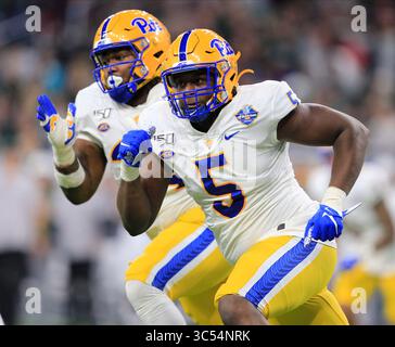 Pittsburgh defensive lineman Deslin Alexandre plays against Tennessee ...