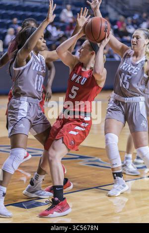 Western Kentucky Lady Toppers guard Kendall Noble (12) hugs head coach ...