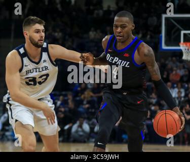 Butler forward Bryce Golden (33) shoots against Connecticut forward ...