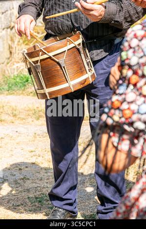 Close-up of a snare drum, percussion instrument on a dark background ...
