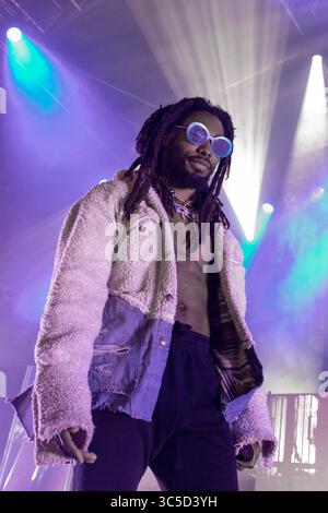 Johnny Venus (Olu Fann) of EarthGang performs onstage during Welcome to ...
