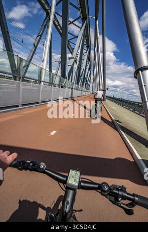 The Snelbinder Brug bicycle and pedestrian bridge over the Waal River ...